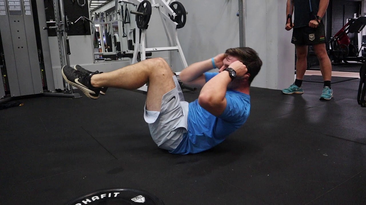 Leg raised alternate knee crunch - movement demo - YouTube