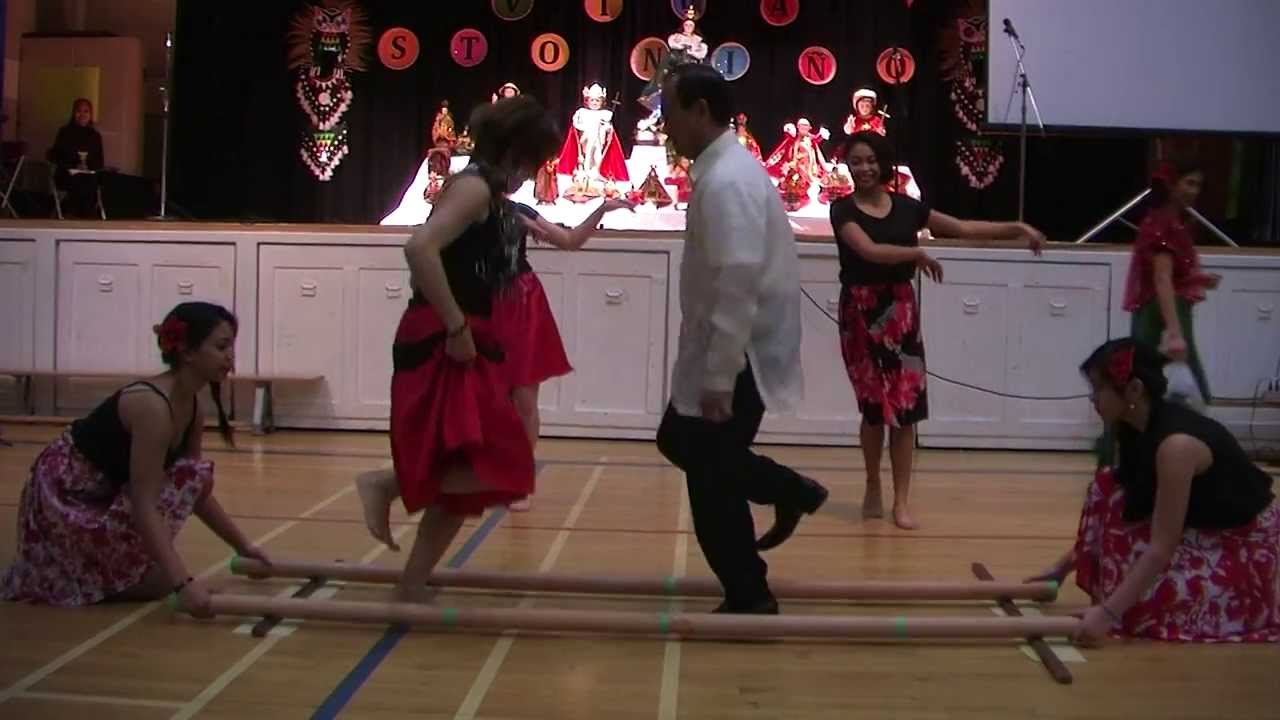 tinikling (or bamboo dance) by AC dancers - YouTube
