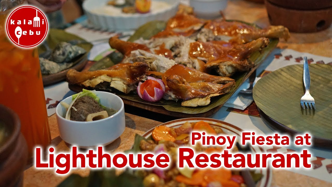 Pinoy Fiesta with Lechon de Leche at Lighthouse Restaurant! - YouTube