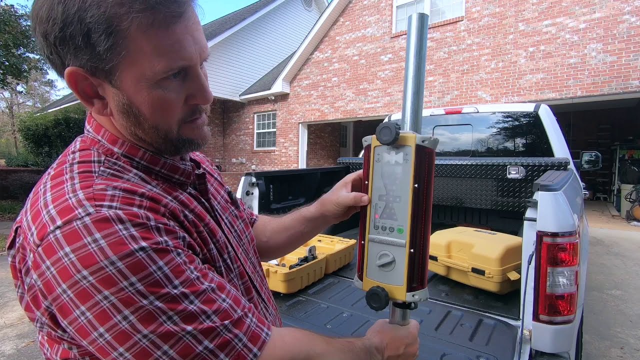 Kubota KX080-3 Digging drainage ditch with excavator mounted Topcon ...