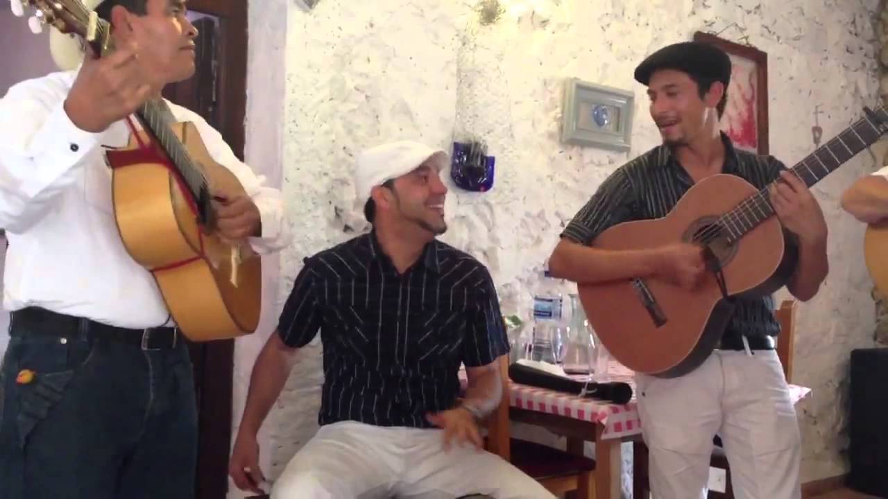 Spanish guitar singers in a countryside restaurant - YouTube