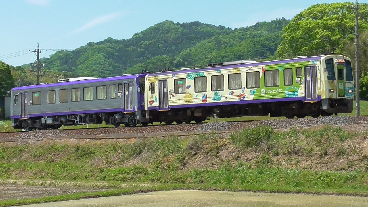 Diesel trains run smoothly on a straight track in Iga,JAPAN with fresh ...