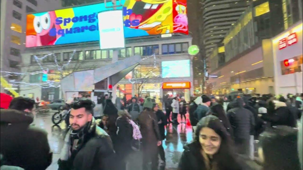 Yonge Dundas Sq & Yonge Street - First Snow, Dec 31, 2023 - YouTube