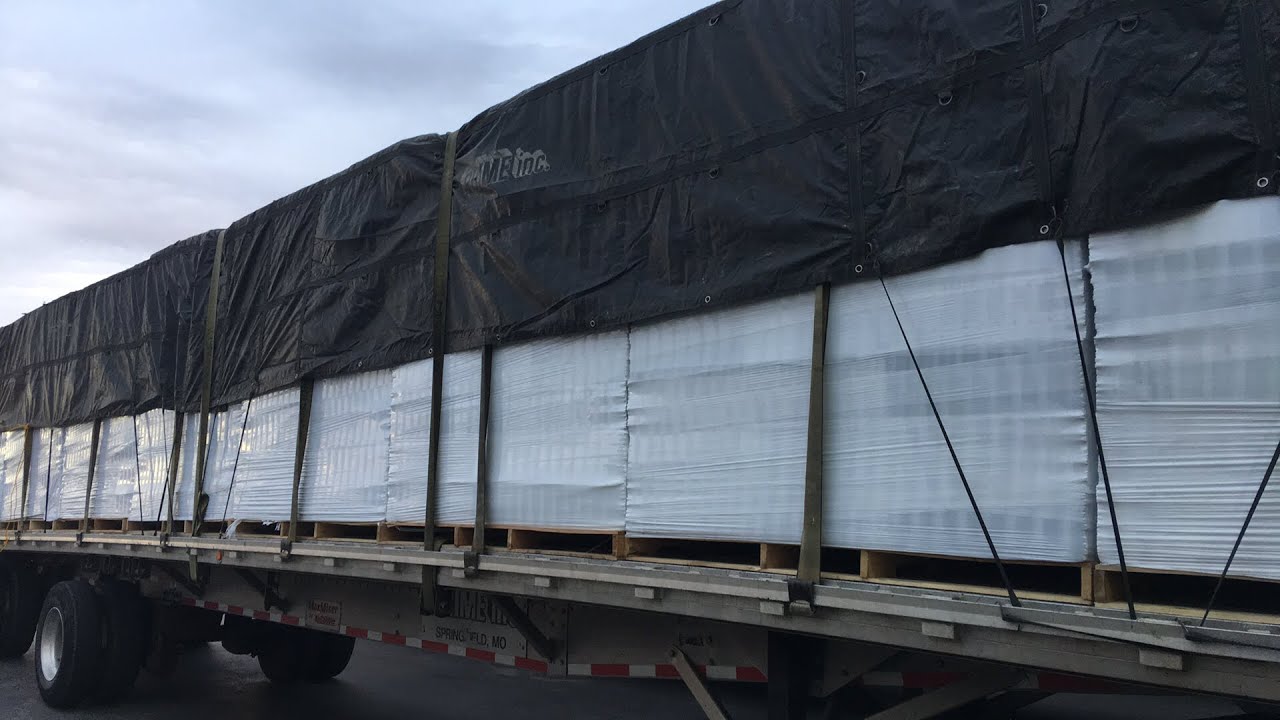 INSULATION LOAD ON TRAILER TARPED & STRAPPED DOWN - YouTube
