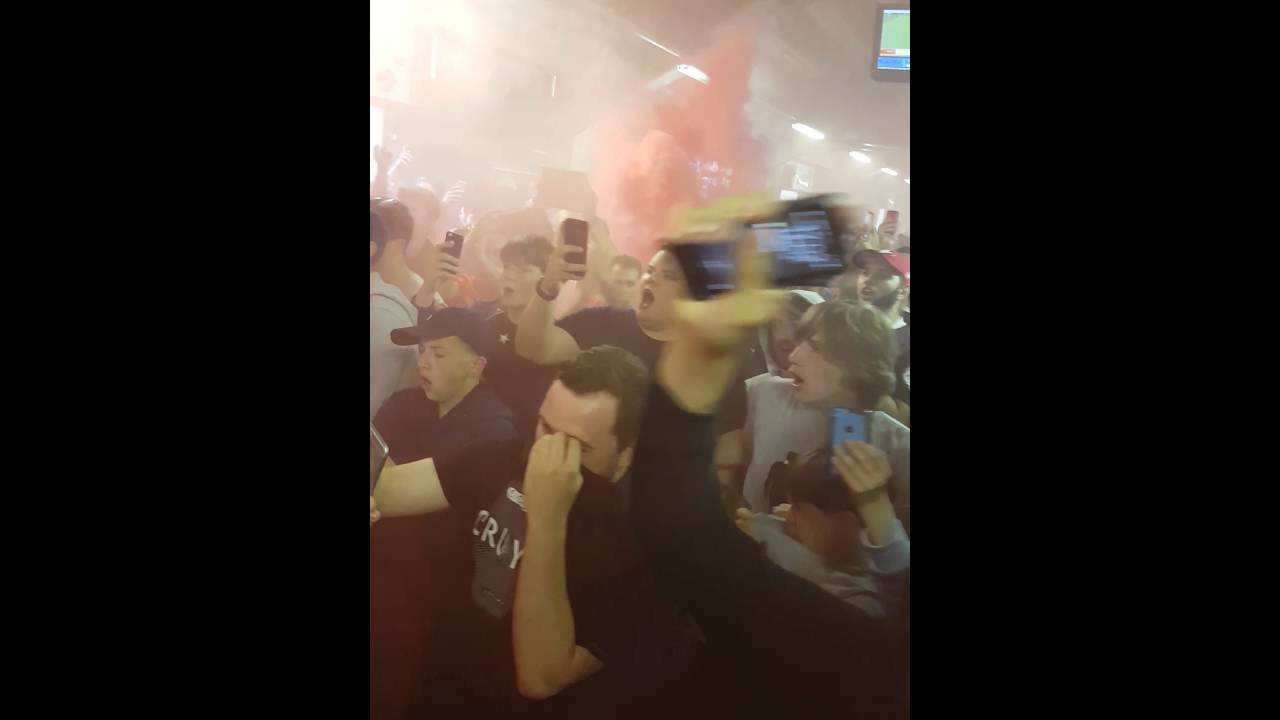 Liverpool pyro in concourse - YouTube