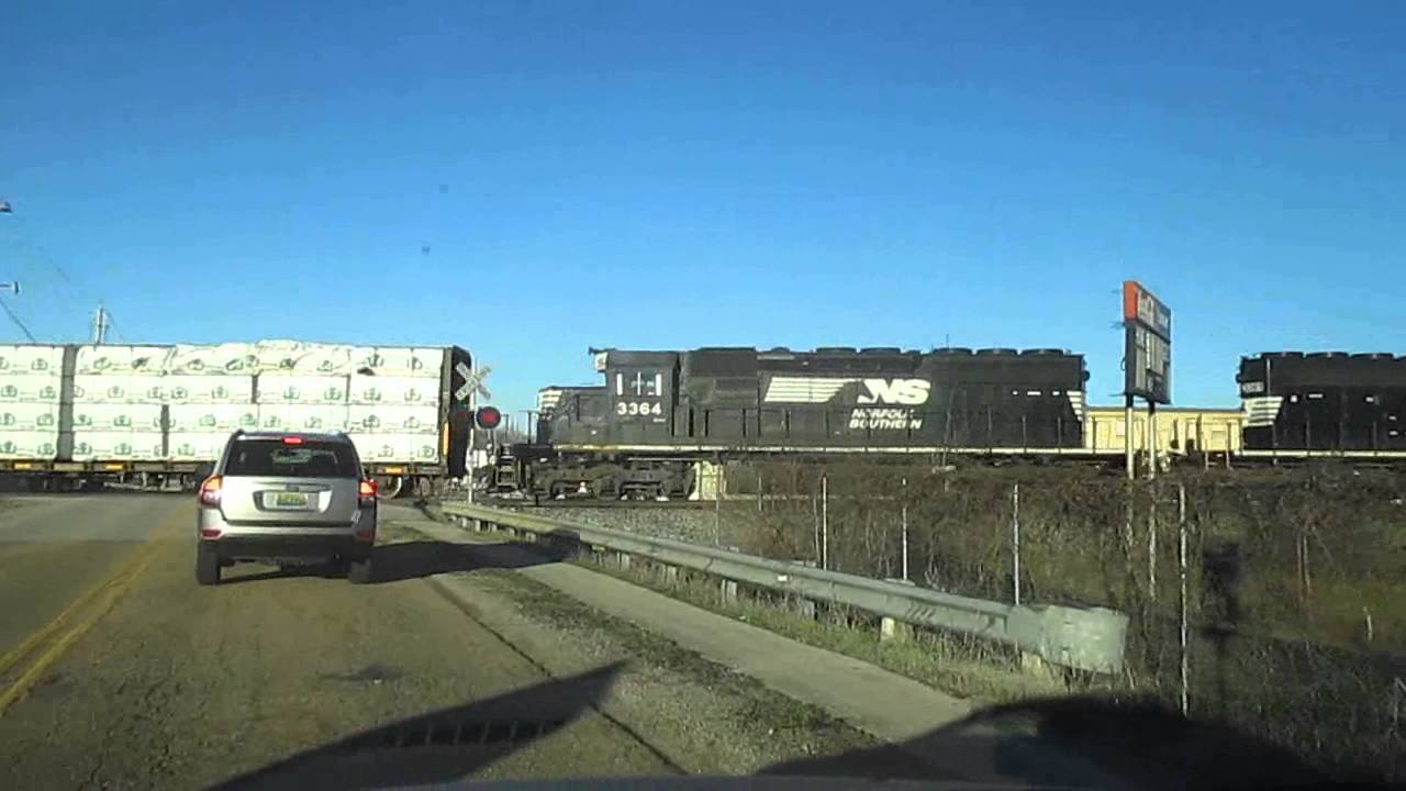 NS 3369 and NS 3364 pull an NS Local Freight through Huntsville, AL ...