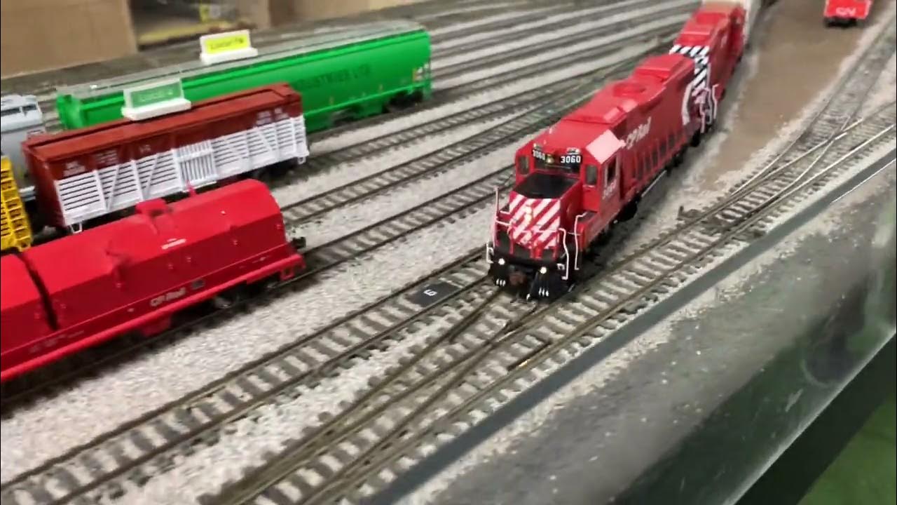 CP Geeps hauling grain over a river and through the yard - YouTube