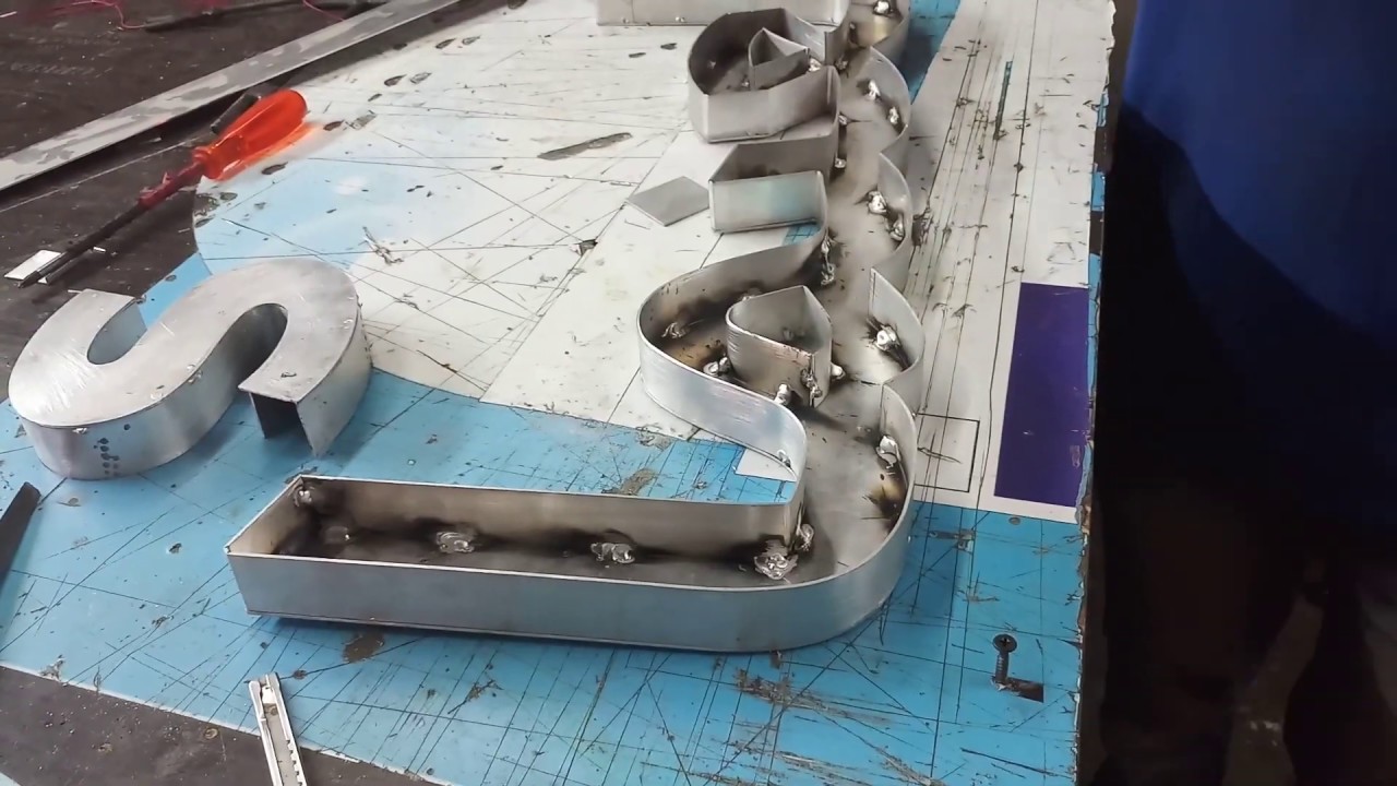 process of molding 3D aluminum letter - YouTube