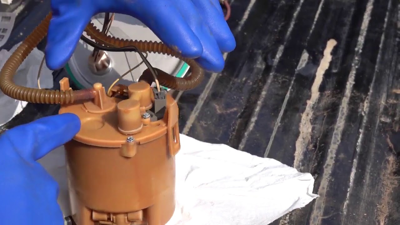 How to remove Fuel Pump From Bottom of Tank 2004 Ford F250 - YouTube