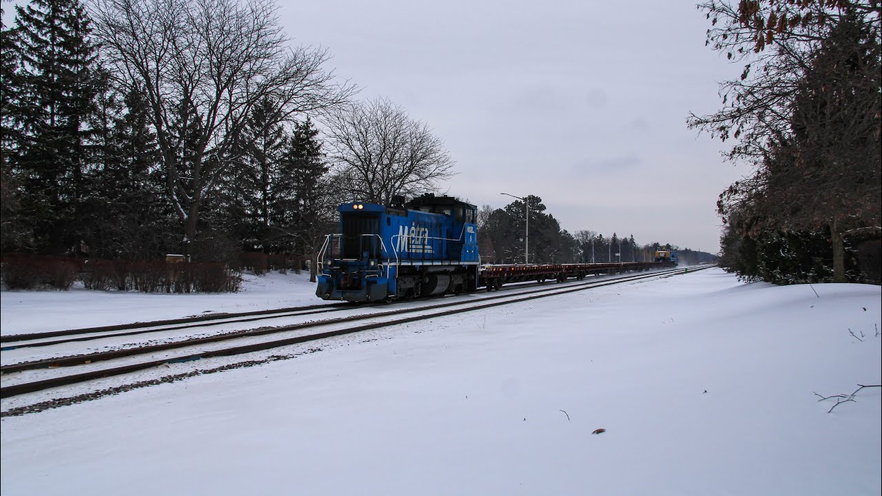 NIRC 9 (SW1500) hauls a Metra work train through Lake Forest - YouTube