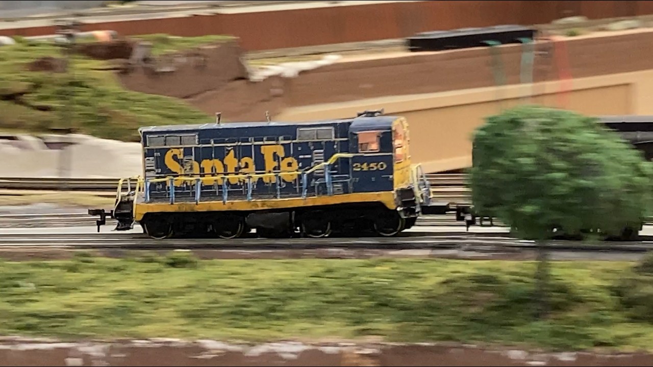The HO Scale Santa Fe Beep and decorated Art Boxcars in action on the ...