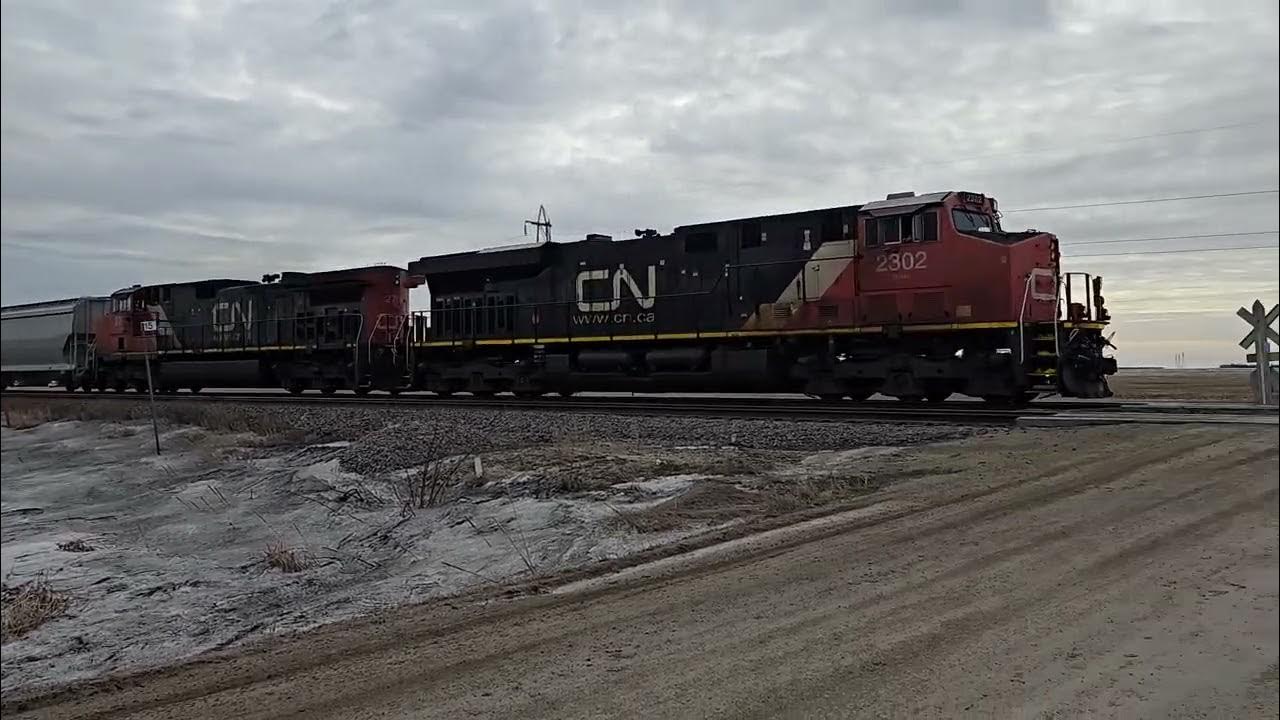 2 in 1. Westbound CN manifest meets eastbound CN manifest at Diamond. March 9th, 2025. - YouTube