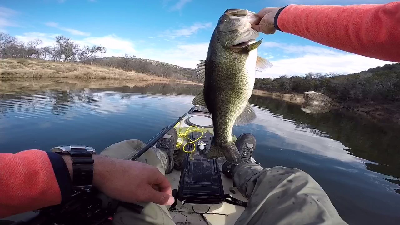 8+ pounder on kayak - YouTube