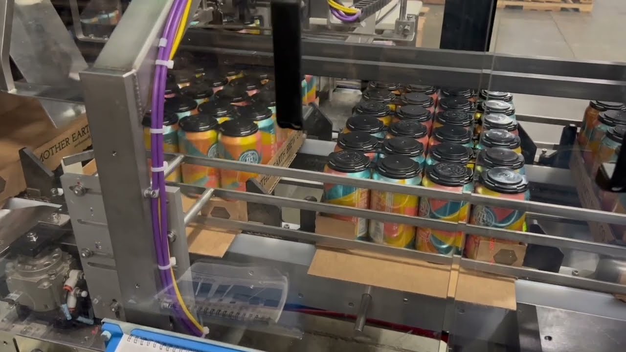 Econocorp Beverage Spartan Cartoner in Mother Earth Brewing Brewery - YouTube