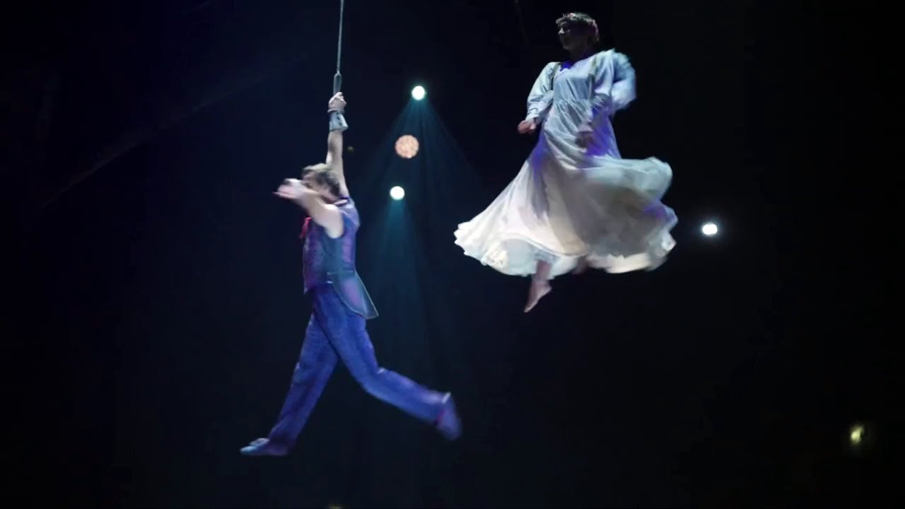 Acrobat returns to home city as circus swings back into capital - YouTube