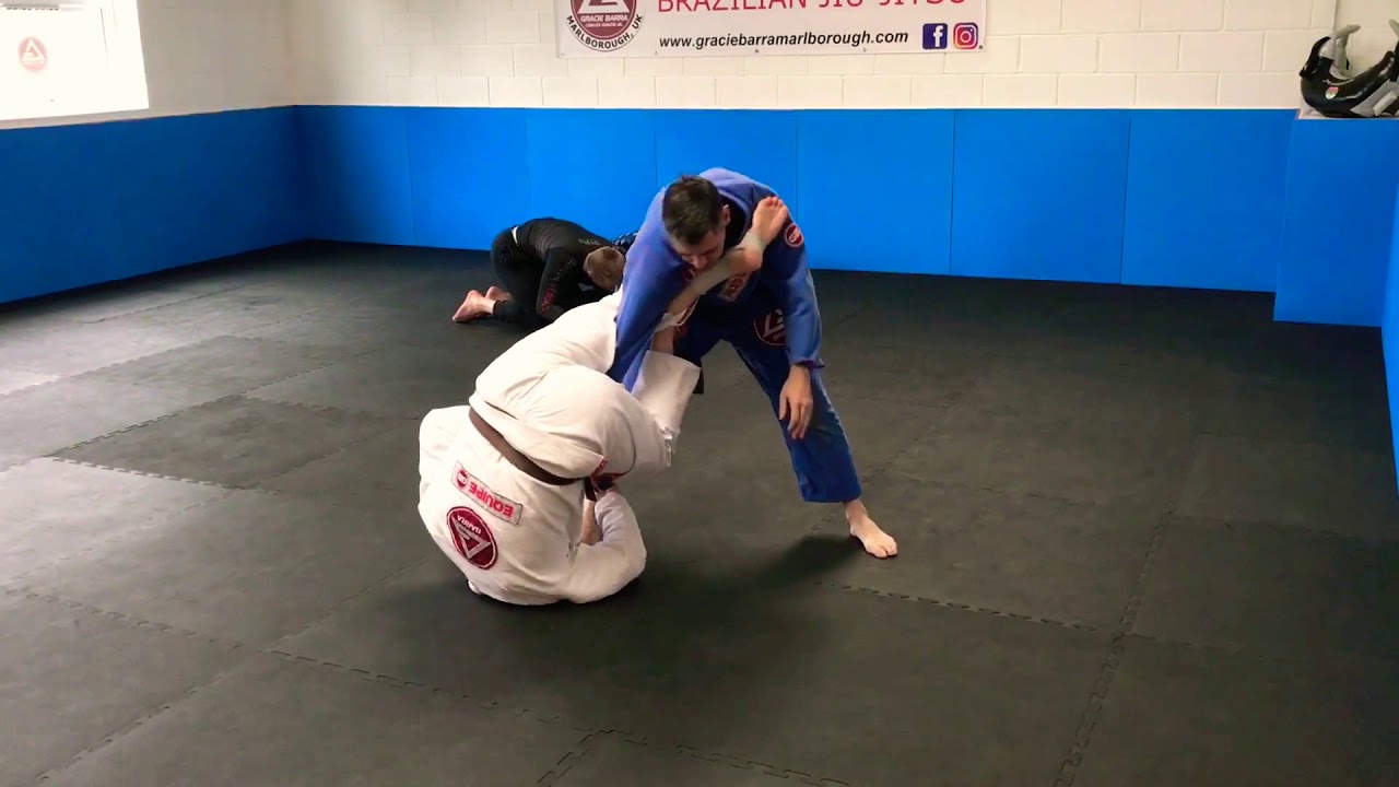 BJJ Reverse Lasso guard sweep to arm bar - YouTube