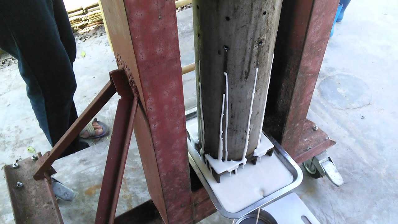 Pressing coconuts for producing oil, Surat Thani - YouTube