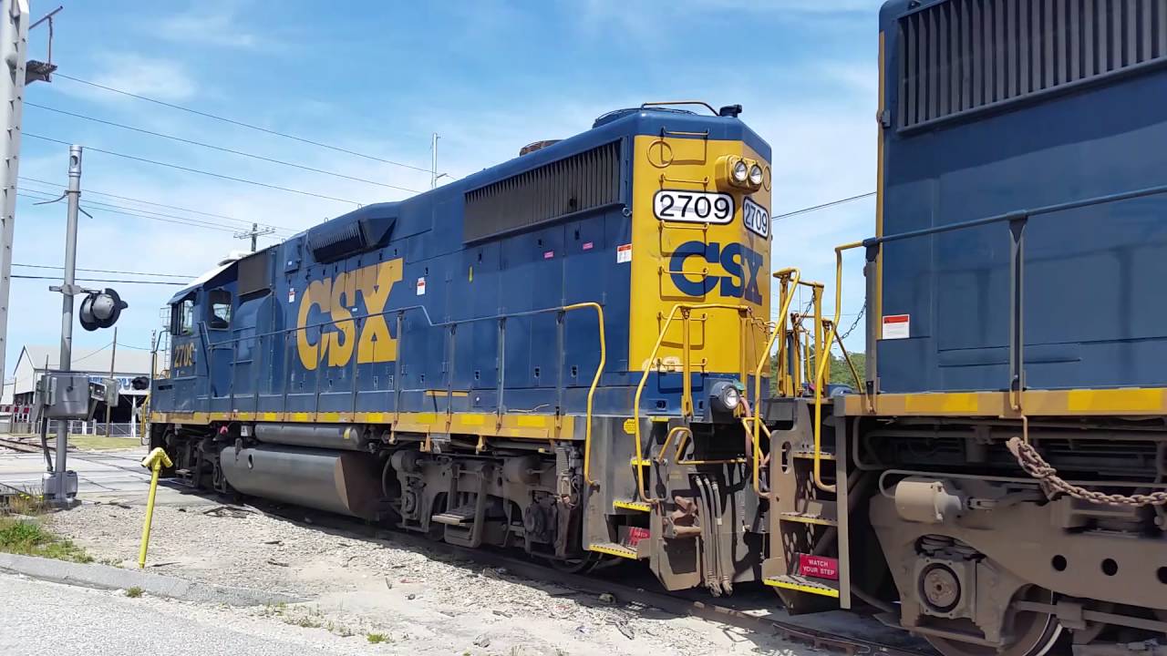 Conductor on Csx Y205-16 poses for the camera & also GP38-2 w/ K5H horn ...