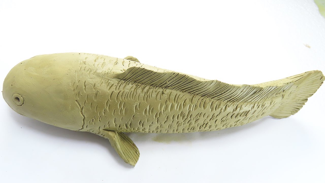 How to create fish using clay make with a men and his skill for build ...