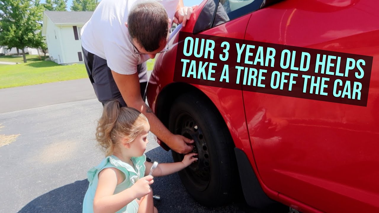 Our 3 Year Old Helps Take A Tire Off The Car - YouTube