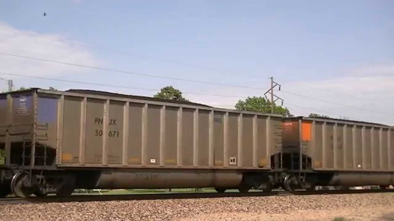 BNSF 9647 Leads a coal train of TGNX PNJX Vinita OK - YouTube