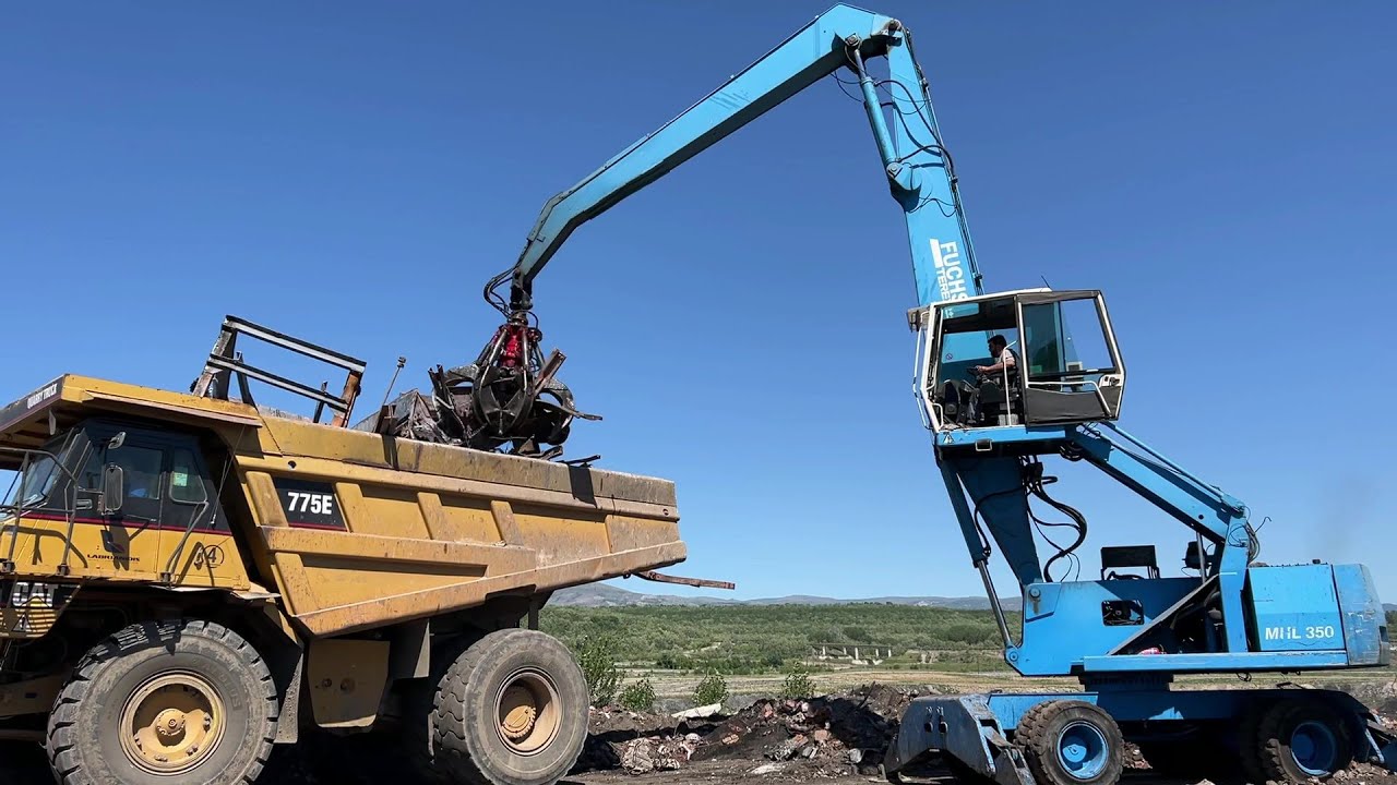 Terex Fuchs MHL350 Loading Scrap Metal On Cat 775E Dumpers - Sotiriadis ...