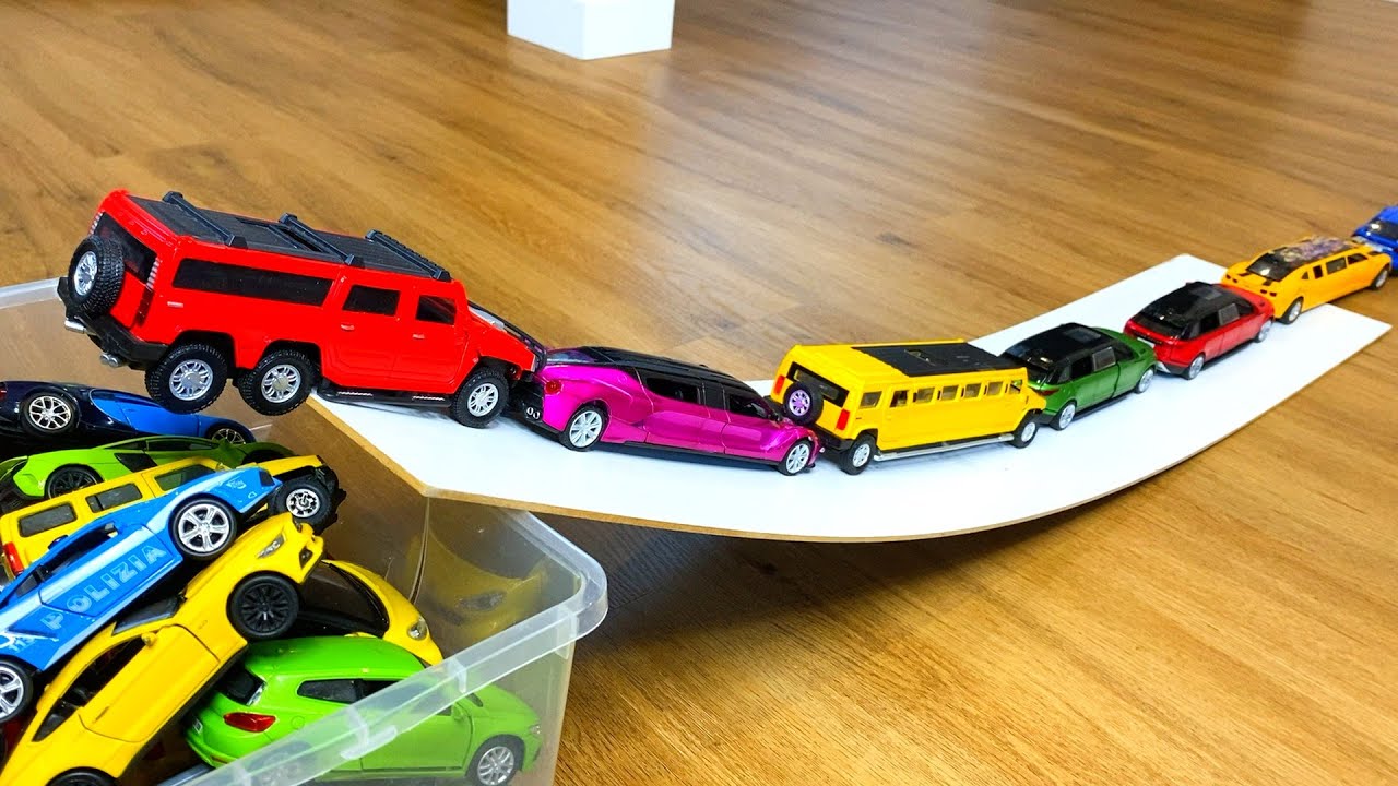 Various Bigger and Smaller Diecast Model Cars Moving Down On Slider #2 ...