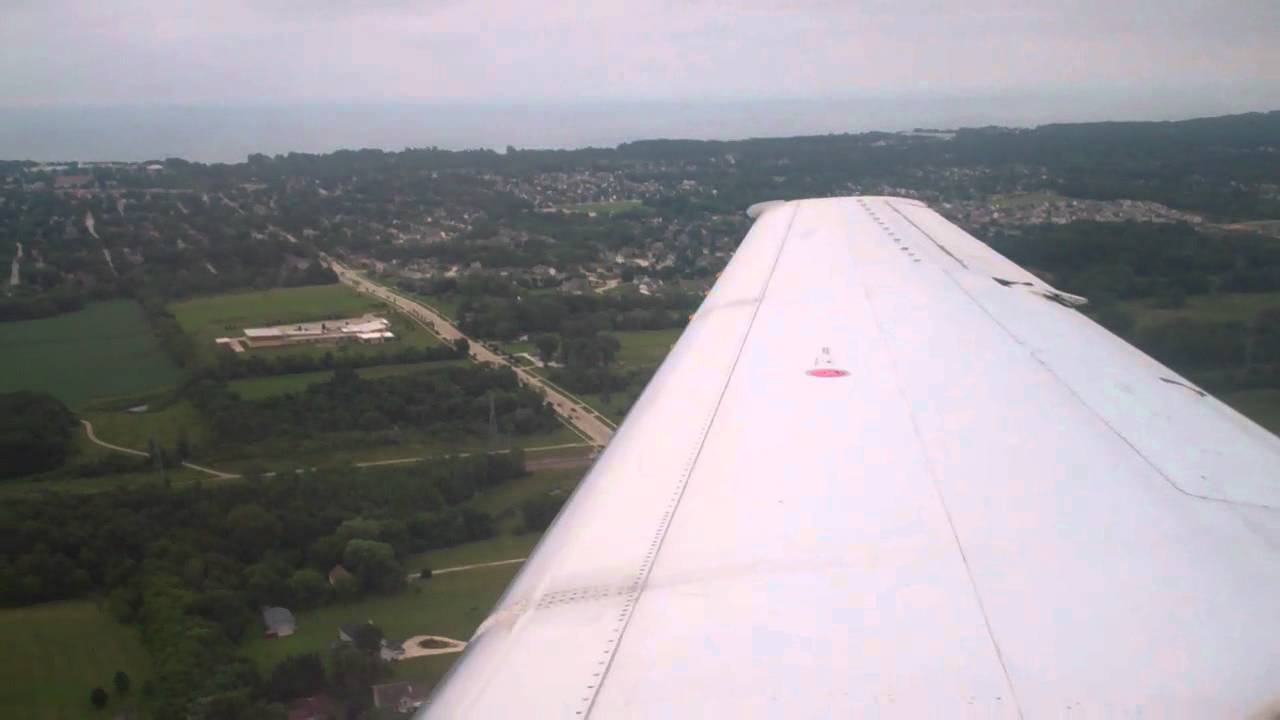 HARD LANDING! frontier erj-140 landing in milwaukee - YouTube