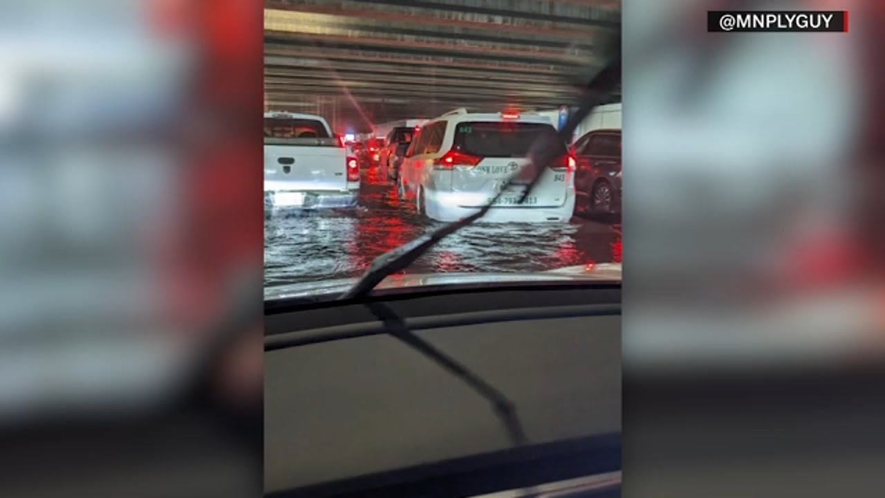 Key Florida airport closed after deluge floods roads, strands cars ...