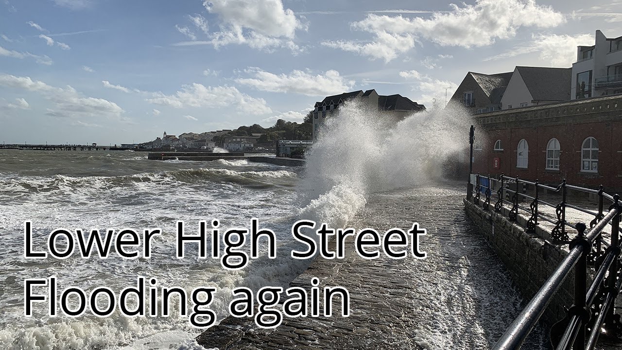 Strong wind and high tide resulting in some flooding in the lower High ...