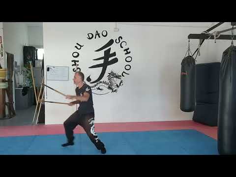 Maneggio doppio bastone corto .