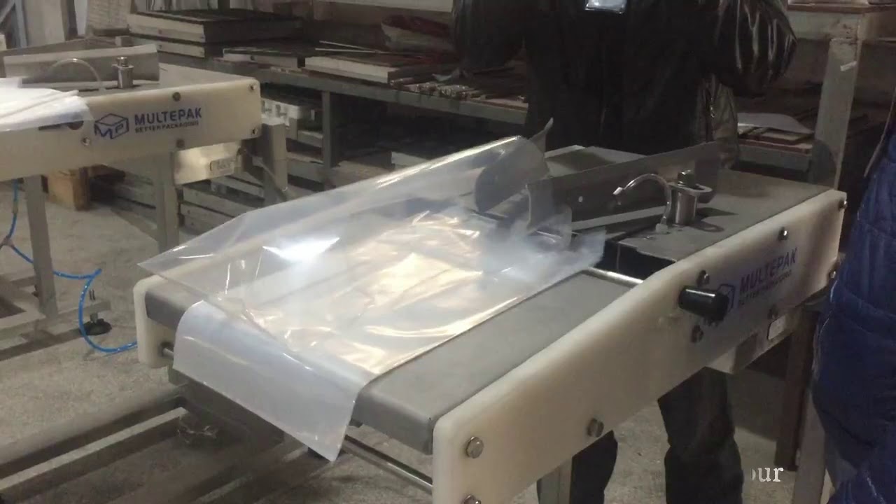 MULTEPAK bag blower opening machine for poultry packing - YouTube