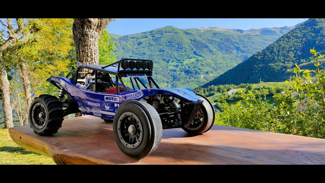 HPI BAJA WITH KRAKEN SX5 SIDEWINDER ROLL CAGE - YouTube