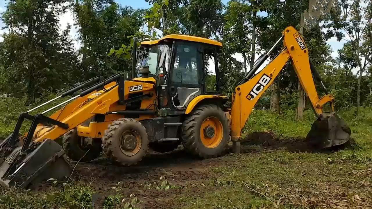 JCB 3DX in Action | Powerful Tree Root Removal - YouTube