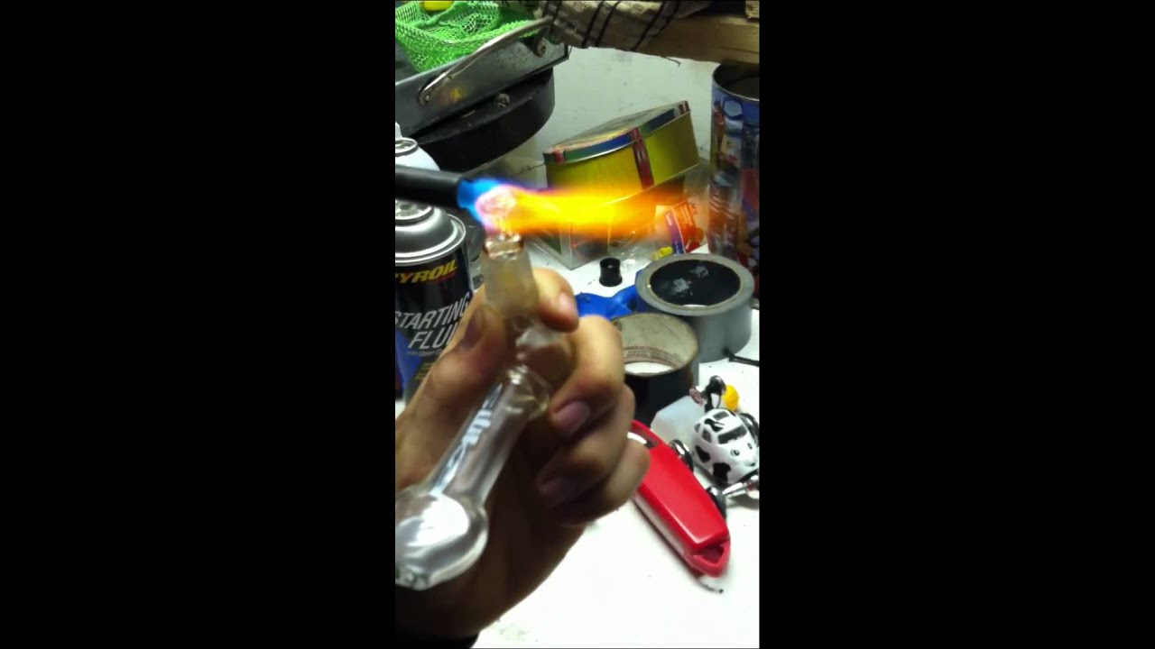 Smoking hash oil out of a nail and dome - YouTube