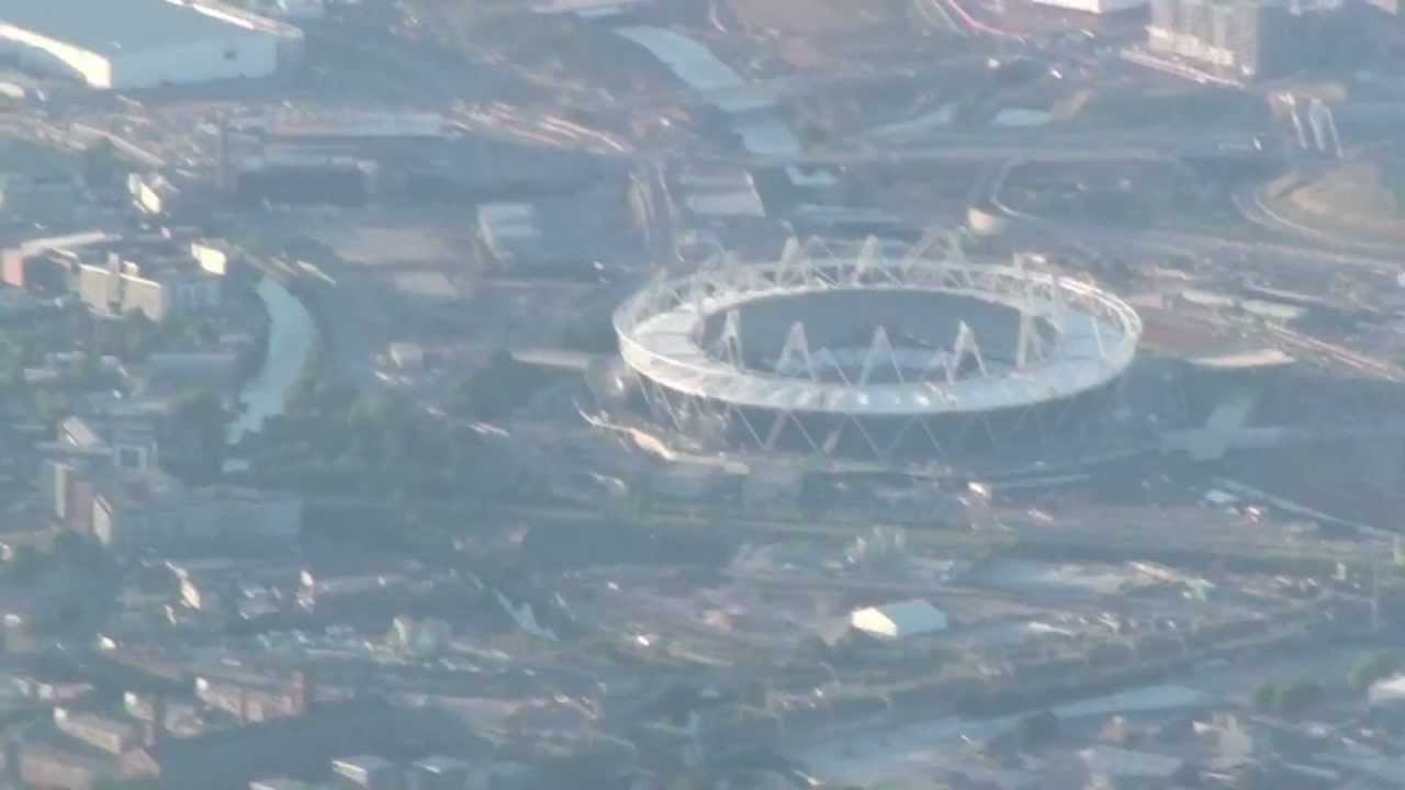 Flying over London into Heathrow on British Airways flight HD - YouTube