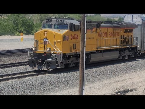 Open Autorack on UP 6474 South @ Old Cajon Station on Main 3. Loaded autoracks, 1 locomotive ...
