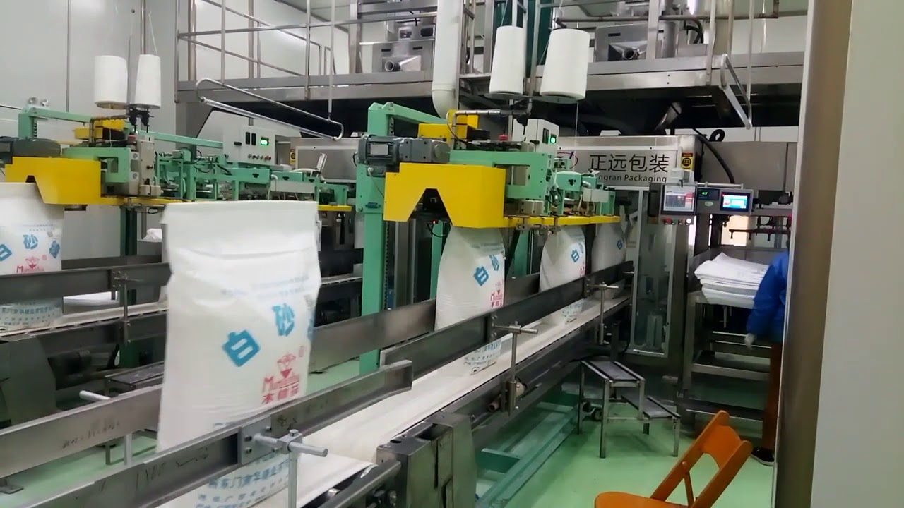Automatic Heavy bag packaging solutions for sugar mill - YouTube