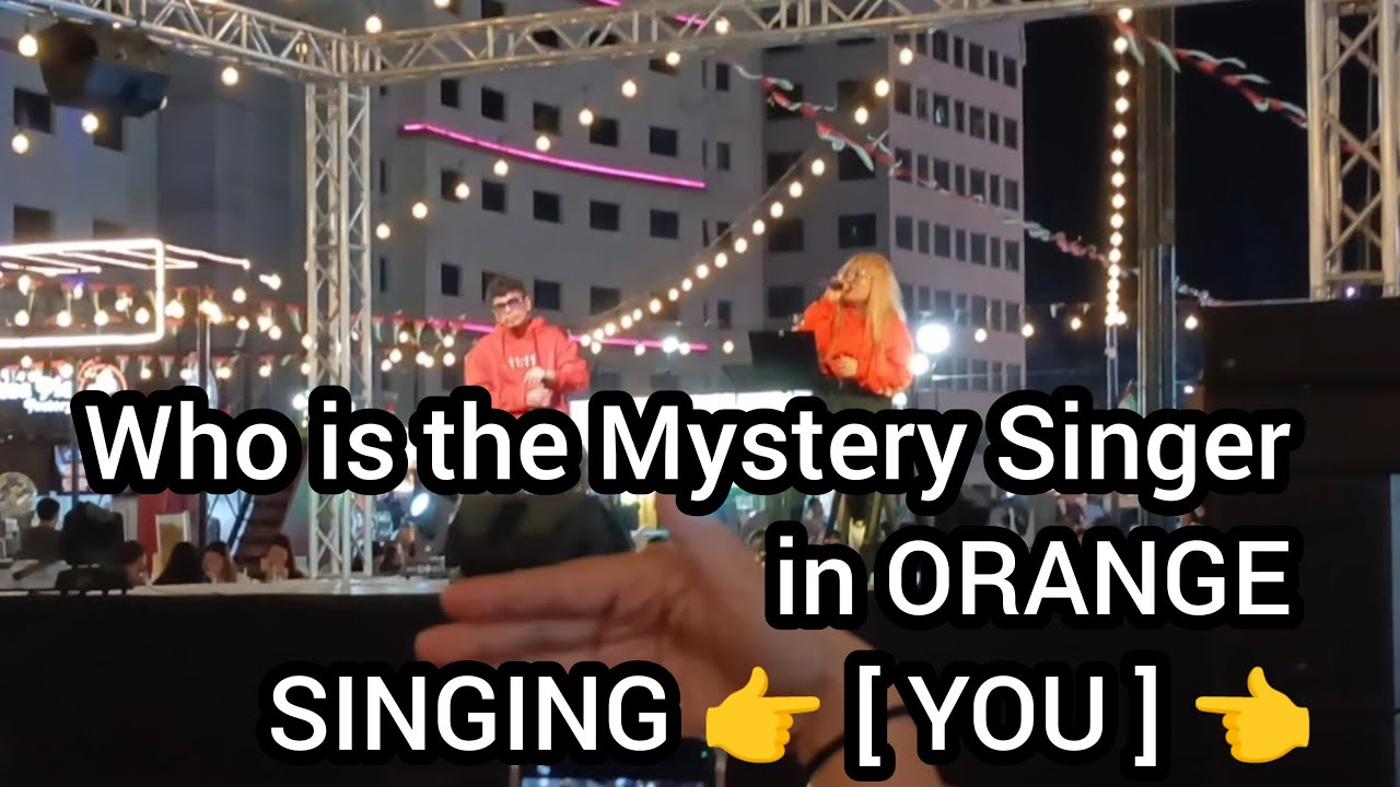 WHO is the MYSTERY SINGER in ORANGE SINGING 👉 YOU 👈 - YouTube