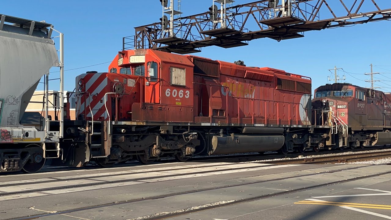 Canadian Pacific 6063 sd-40 pac-man unit trailing on a train at Franklin Park Illinois - YouTube