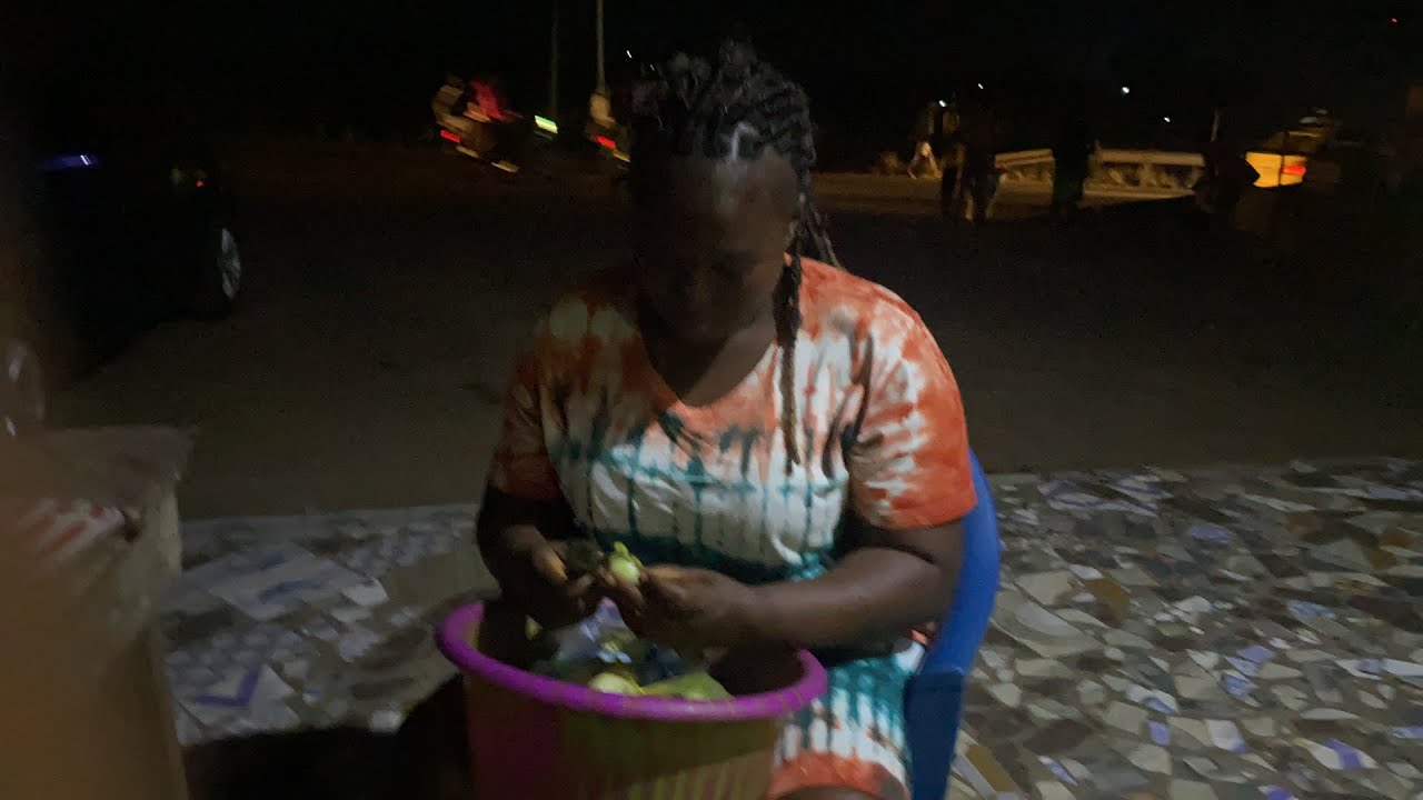 African girl working at night in Liberia Africa - YouTube