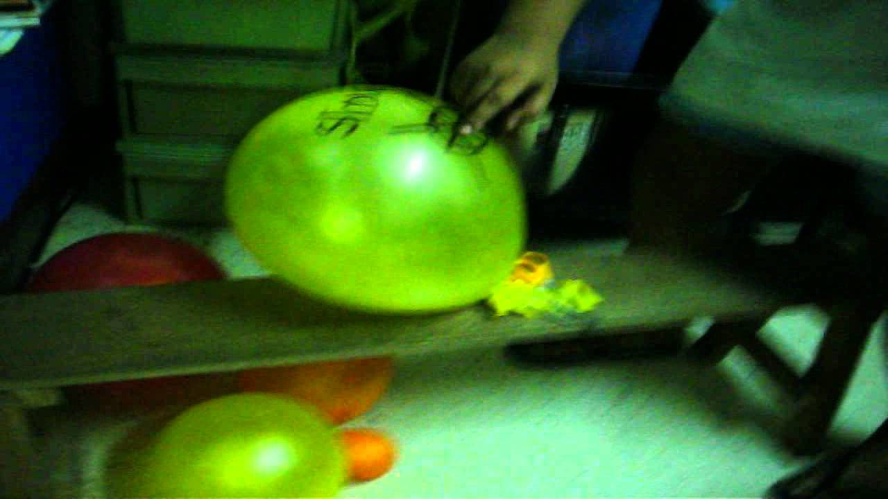 slow motion pop balloon video 2 - YouTube