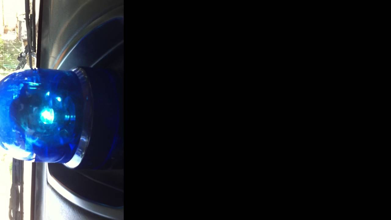 Blue rotating beacon - YouTube