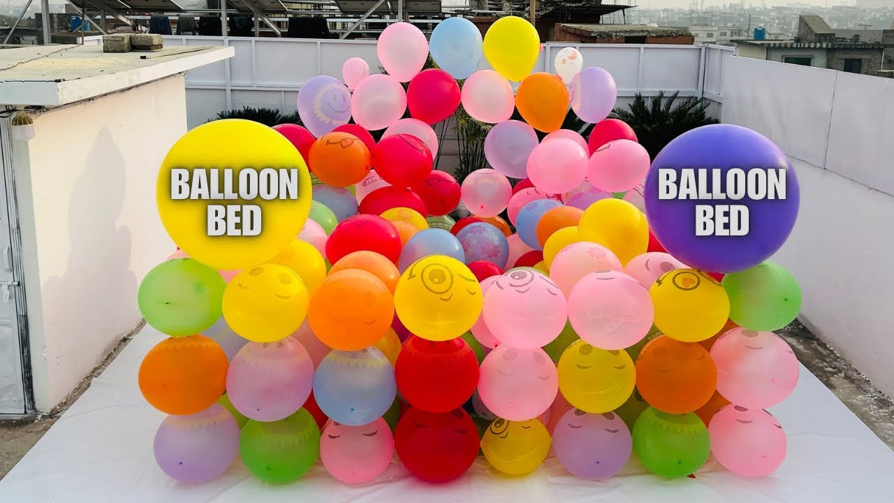World's Biggest Balloon Bed Popping Satisfying Video| Balloon Pop - YouTube