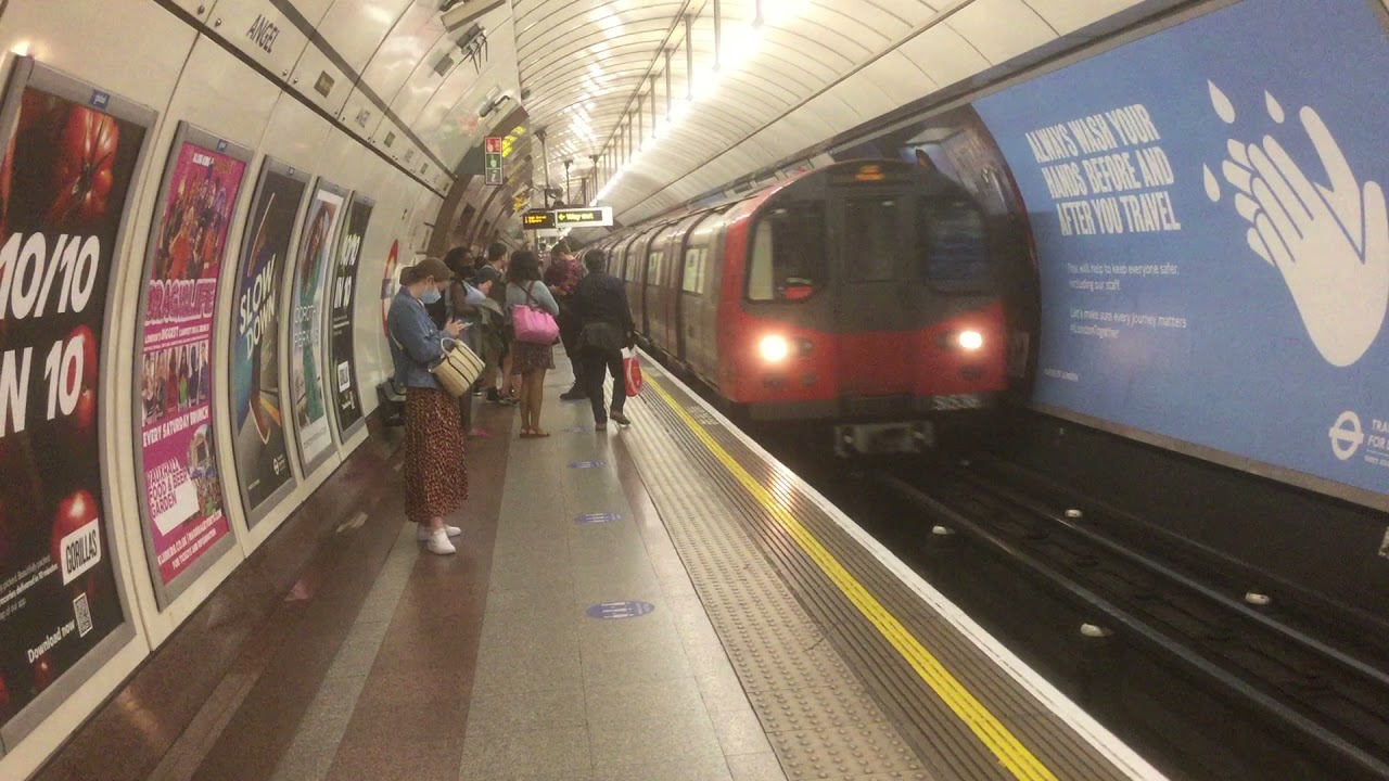 Northern line arriving at angel - YouTube