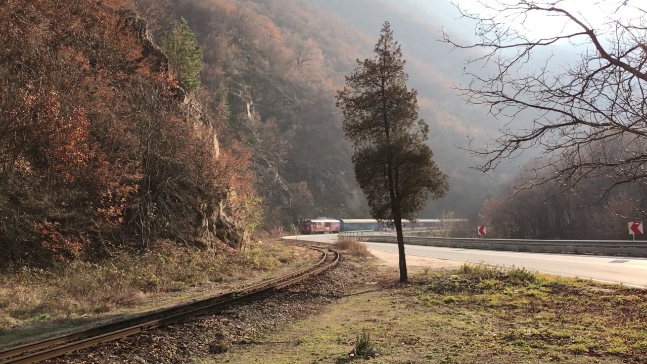 BDZ 77-002 clags down the valley approaching Tsepina with train 16104 ...