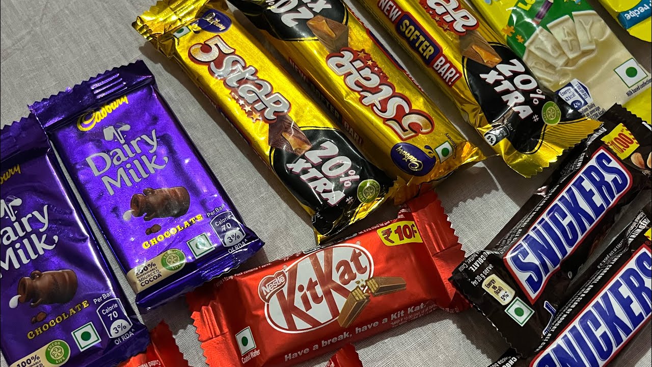 Lots of candies, surprises toy for children, lots of dairy milk , candy ...