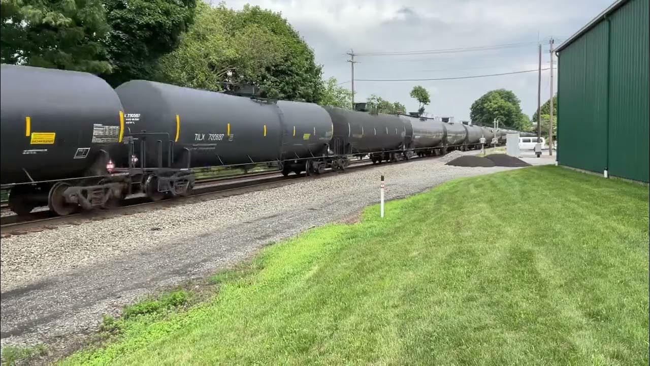 West bound ns 4479 dc to ac ac44c6m followed by csx 5302 in palmyra crude oil train at 1:55 pm ...