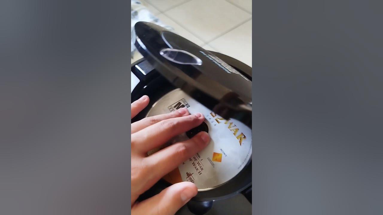 Placing a PS3 disk in a CD player - YouTube