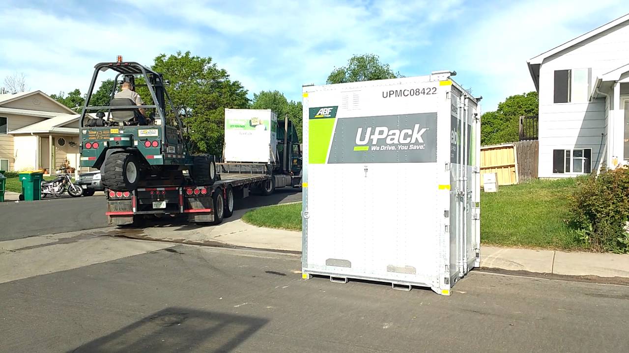 pod forklift loading onto truck - YouTube